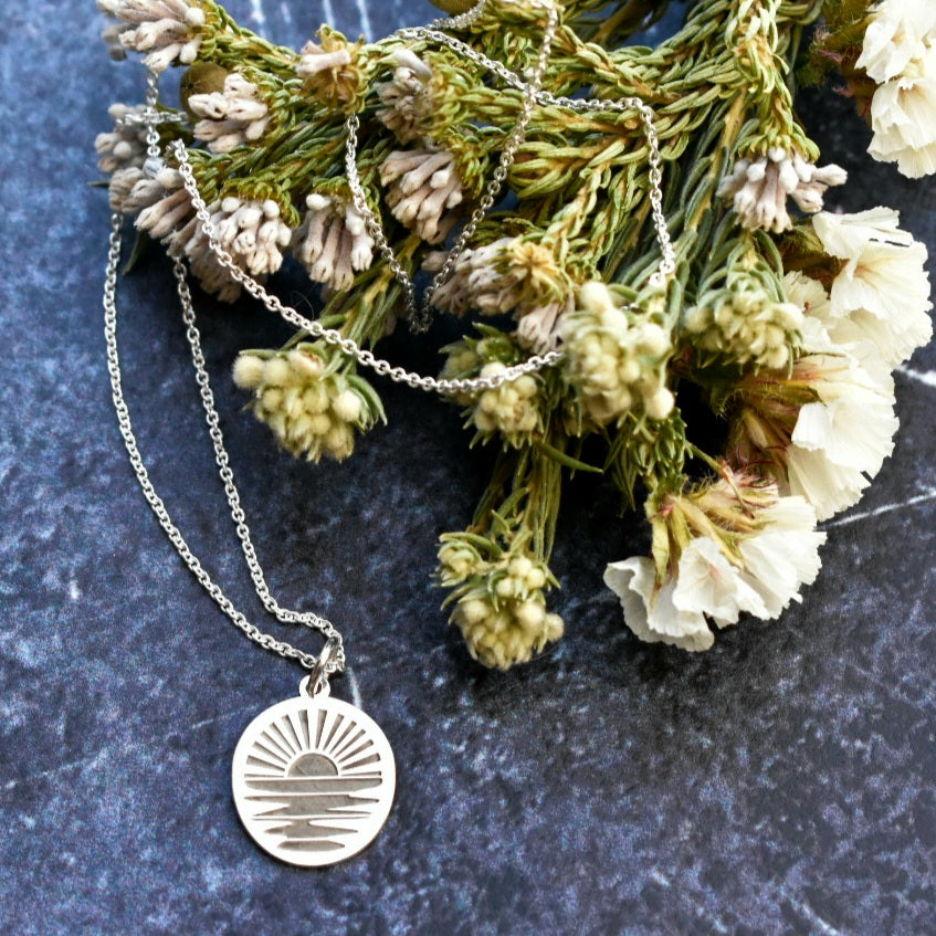 Sunrise pendant – Marked by Light