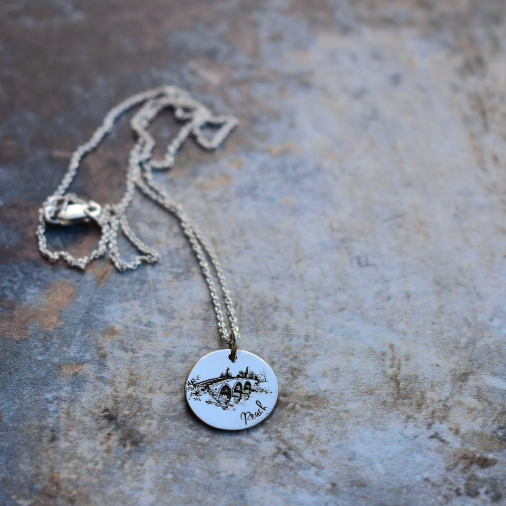 Reach Pendant – Marked by Light